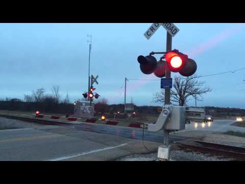 Amtrak 17 passes a GRS gate mechanism with Modern Industries equipment