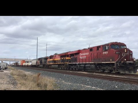 Canadian Pacific #8869 ES44AC leads MSZSH with CN 2258 ES44DC trailing, Rosenberg TX 3/6/22
