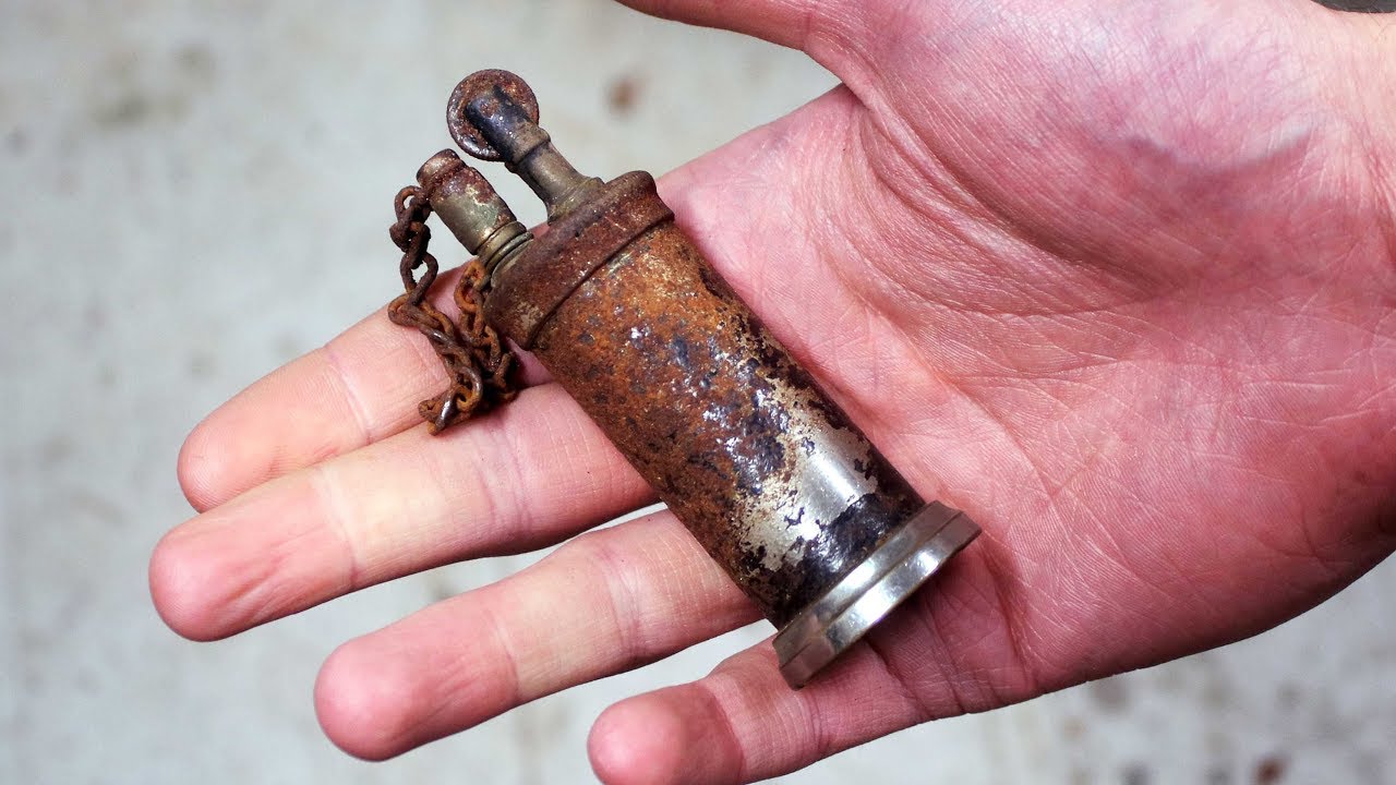 Antique rusty lighter - Restoration project