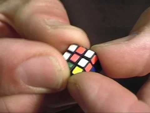 Solving The Smallest Rubik Cube In The World
