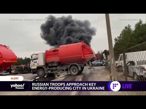 Ukrainians battle Russian forces over key energy-producing city