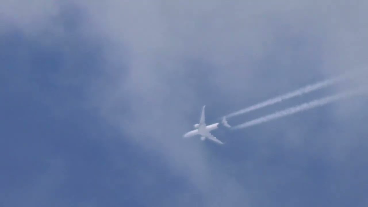 Lufthansa Airbus A350-900 trailing between the clouds!