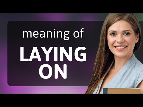 Laying on | what is LAYING ON definition