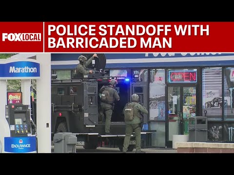 Allen Park police standoff with barricaded man inside gas station