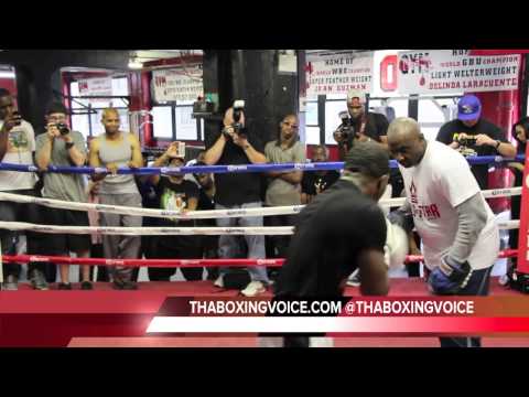 ADRIEN BRONER AND TRAINER MIKE STAFFORD DOING MITT WORK