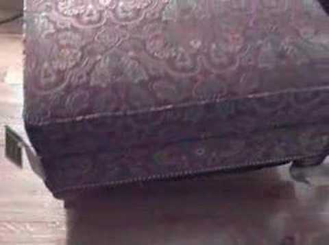 Ethan Allen damaged Ottoman
