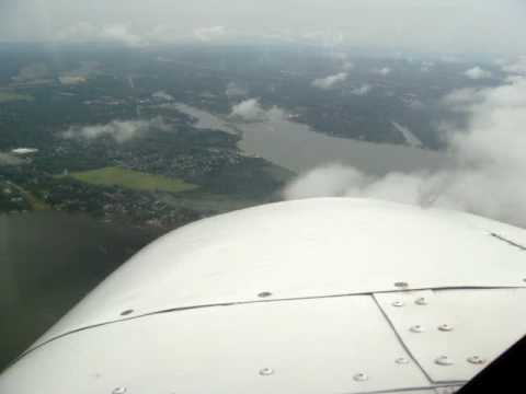 Mooney Exec landing at Gabreski Airport, West Hampton, NY