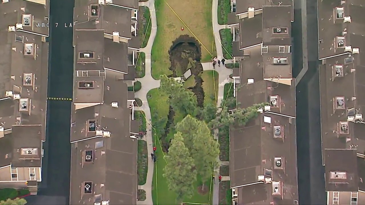 WATCH LIVE: Massive sinkhole opens up at condominium complex in La Habra | ABC7
