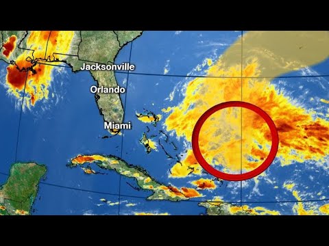 Hurricane center keeps tabs on system in tropics
