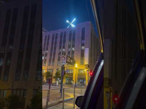 New Twitter building logo is now X with blinking lights. July 30, 2023