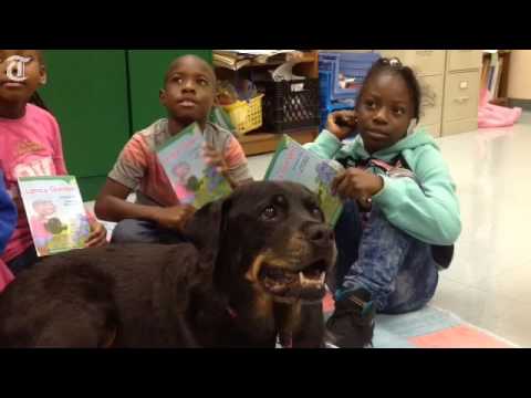 Alexander II second-graders strengthen skills by reading to dogs
