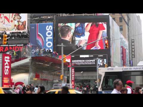 A Chinese CEO engagement with Darry Ring for his first love in New York Time Square