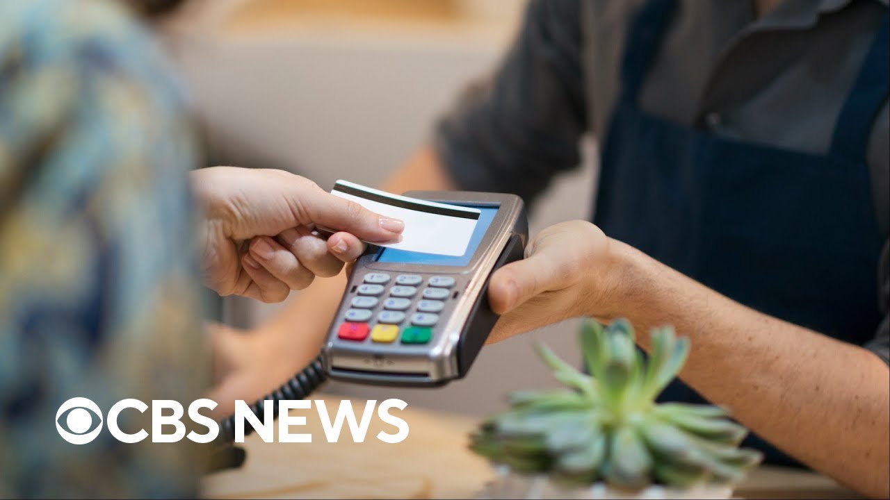 Americans are saving less, spending 