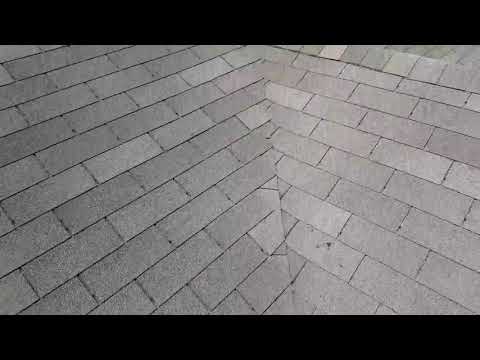 Repaired roof with ring shank rubber grommet nails