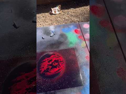 What is black-and-white and red all over  #art #spraypaint #artist#shorts #planet