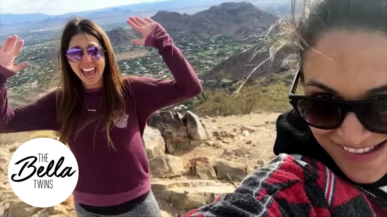 Brie hikes her booty off while hitting a holiday trail (Spoiler: Cactus in Santa gear)