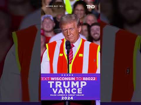 Trump tells story of his garbage truck press conference while donning a neon safety vest