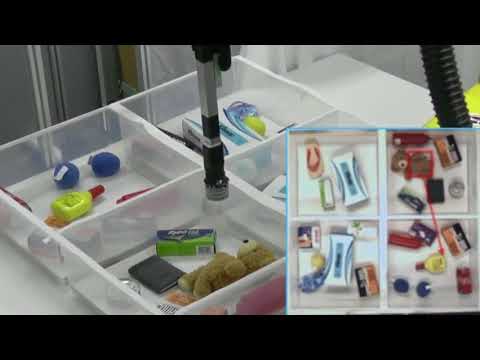 Interactively Picking Real-World Objects with Unconstrained Spoken Language Instructions