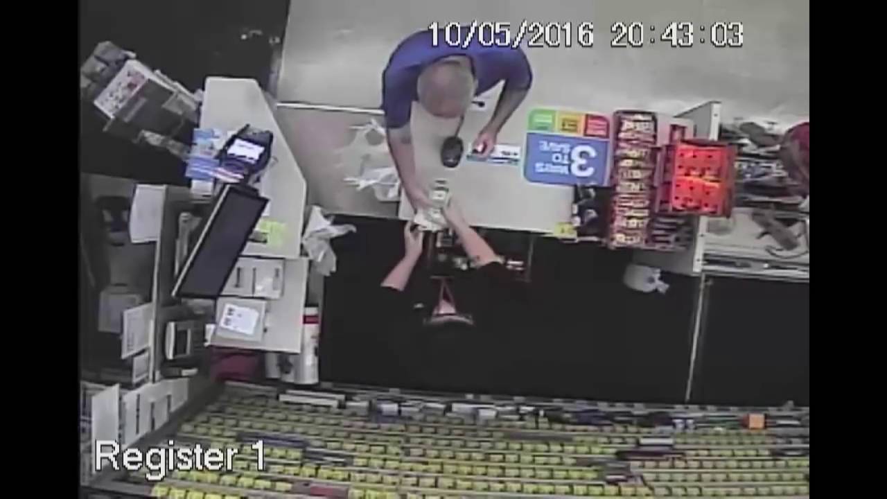 Detectives search for armed suspect in Walgreens robbery