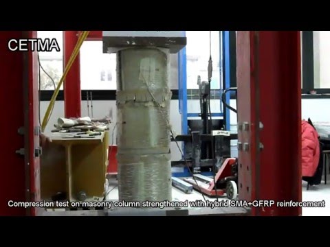 Compression test on masonry column strengthened with hybrid reinforcement based on SMA and GFRP