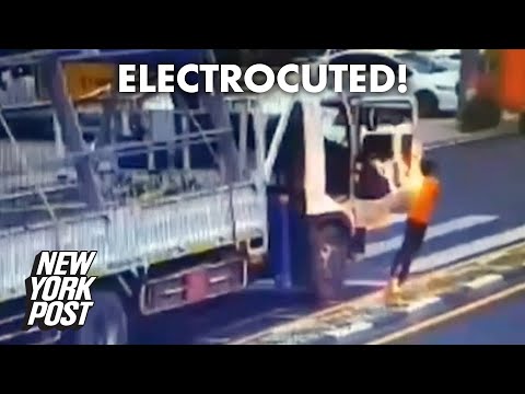 Truck driver survives being electrocuted after steel bars touch overhead power cable | New York Post