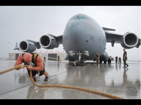 Pulling a Boeing - Pre-Med Physics - Calculate force given coefficient of rolling friction