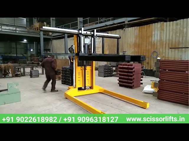 Paper Reel Stacker - VEDANT Hydraulic Paper Reel Stacker Manufacturer ...