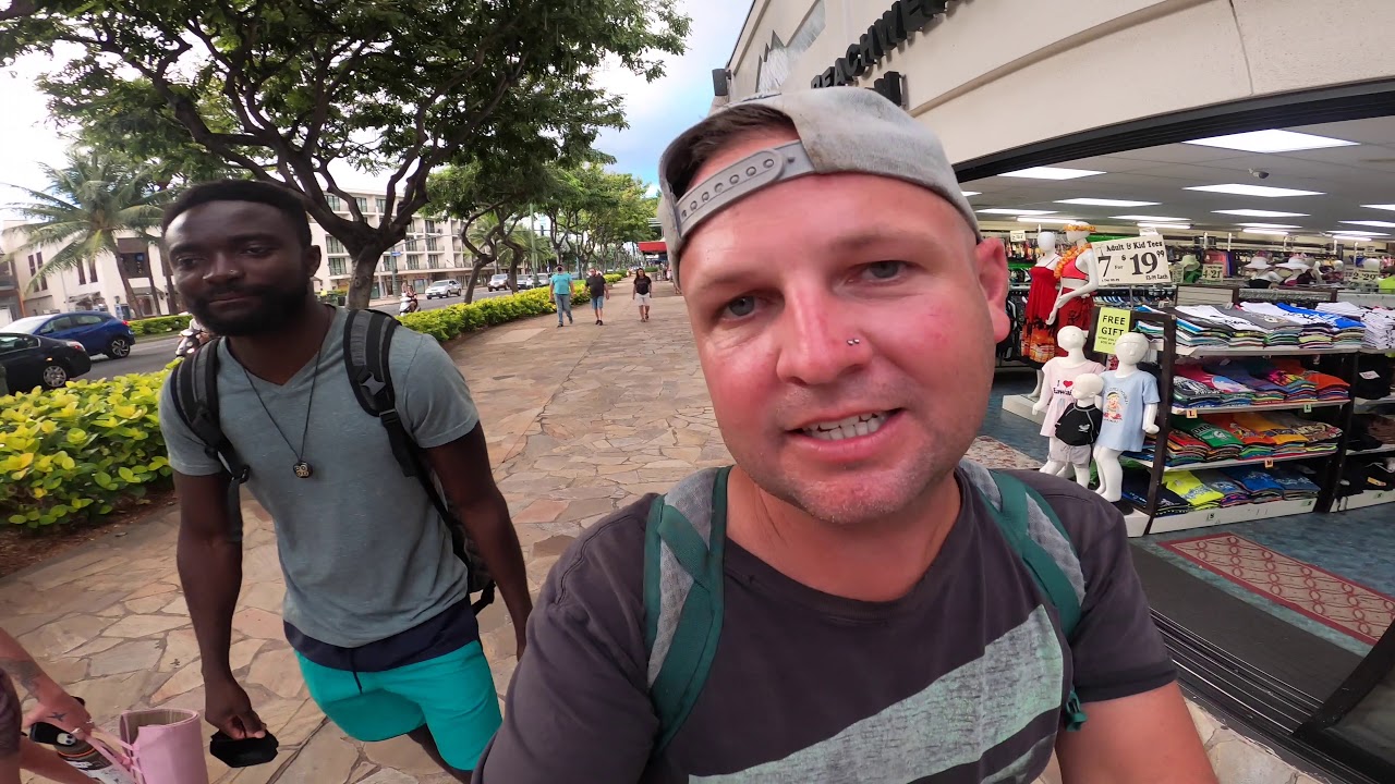 Getting our noses pierced at Skin Deep Tattoo in Honolulu Hawaii. Nick cried like a baby!