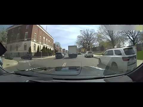 Dash and body cam footage shows police pursuit of a stolen box truck in downtown Waterbury, CT