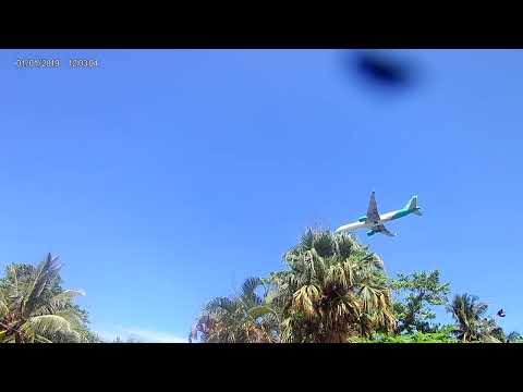 Plane flying over Vaitogi, American Samoa