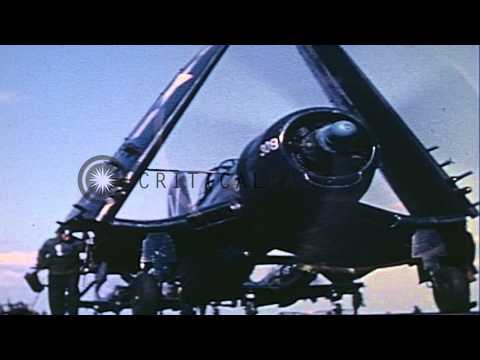 US fighter aircraft F4U Corsair and bomber aircraft AD-1 Skyraider on flight deck...HD Stock Footage