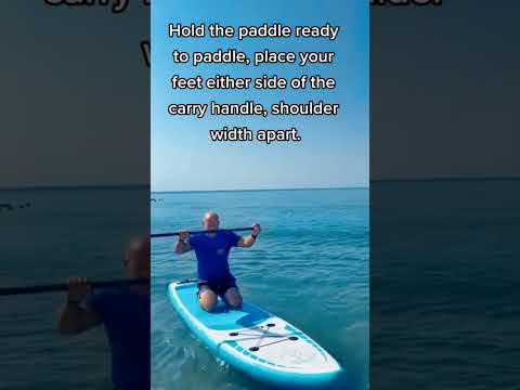 How to stand up on a paddleboard #paddleboard #paddleboarding #learntopaddleboard #howtopaddleboard