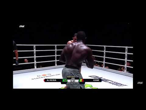 Marcus Almeida taking down Oumar Kane with double leg takedown