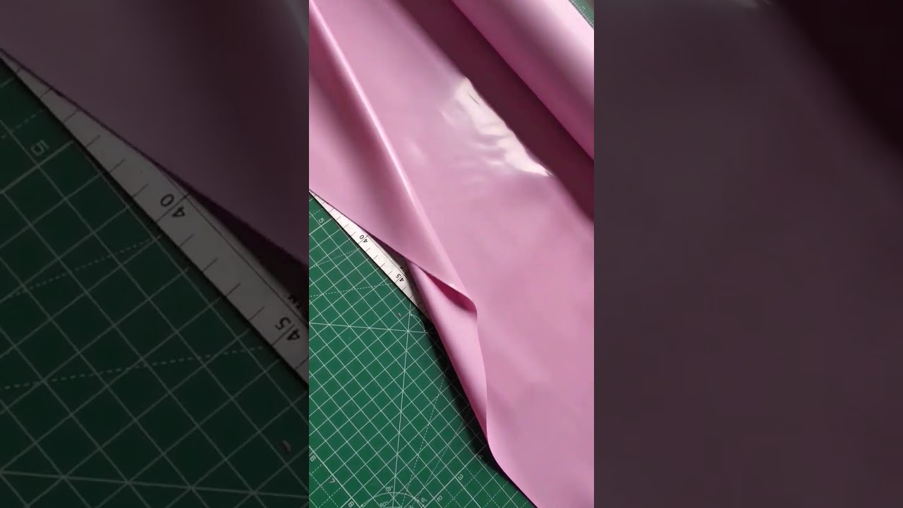 Unrolling the Lilac latex sheet for the first time 🤩🤩 #latex #latexfashion #fashion