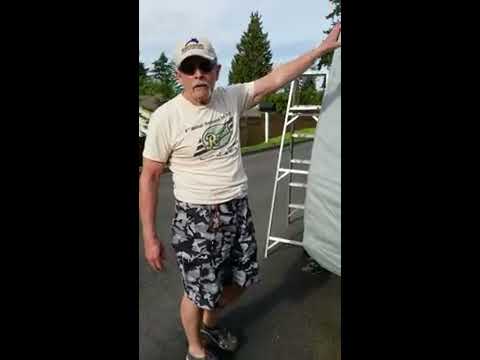 Placing a cover on the R-Pod travel trailer