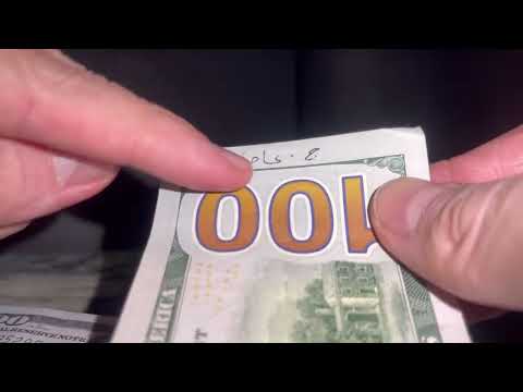 Changing 100 dollar bills in the Philippines