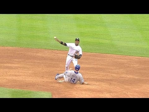 LAD@COL: Arenado's diving stop starts a double play