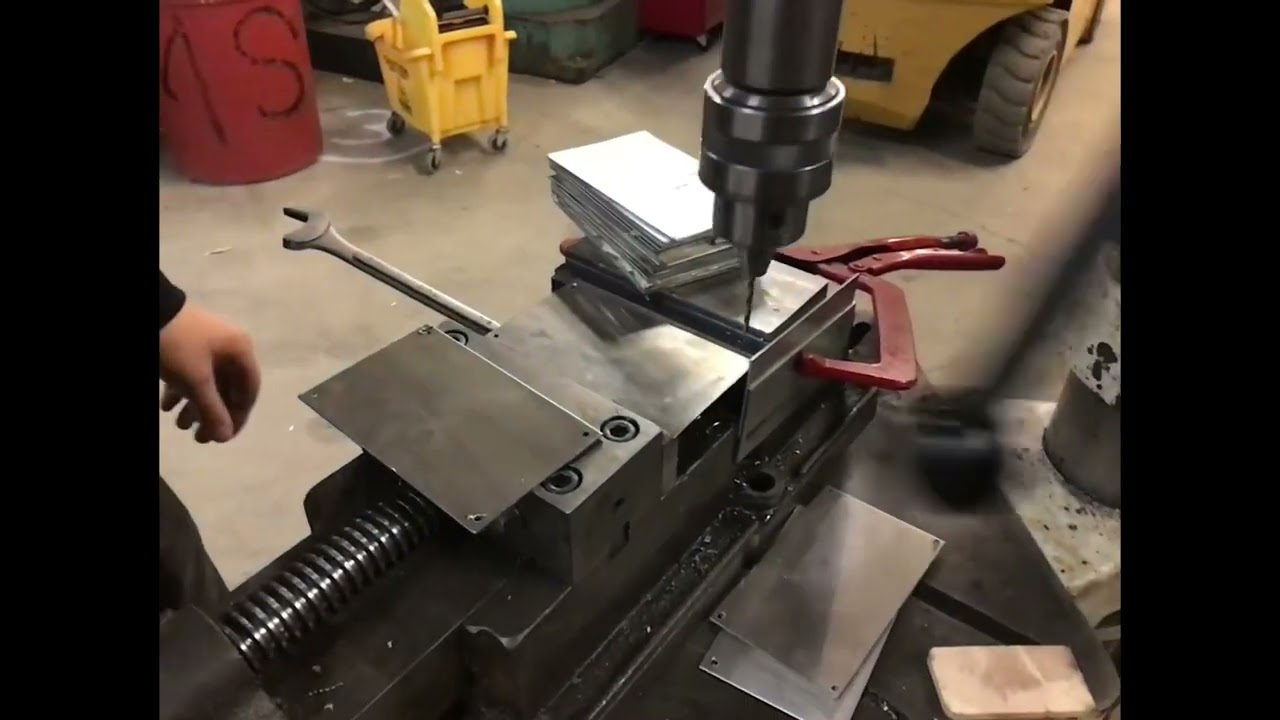 Making Stock Stainless Nameplates - Royal Machine Solutions