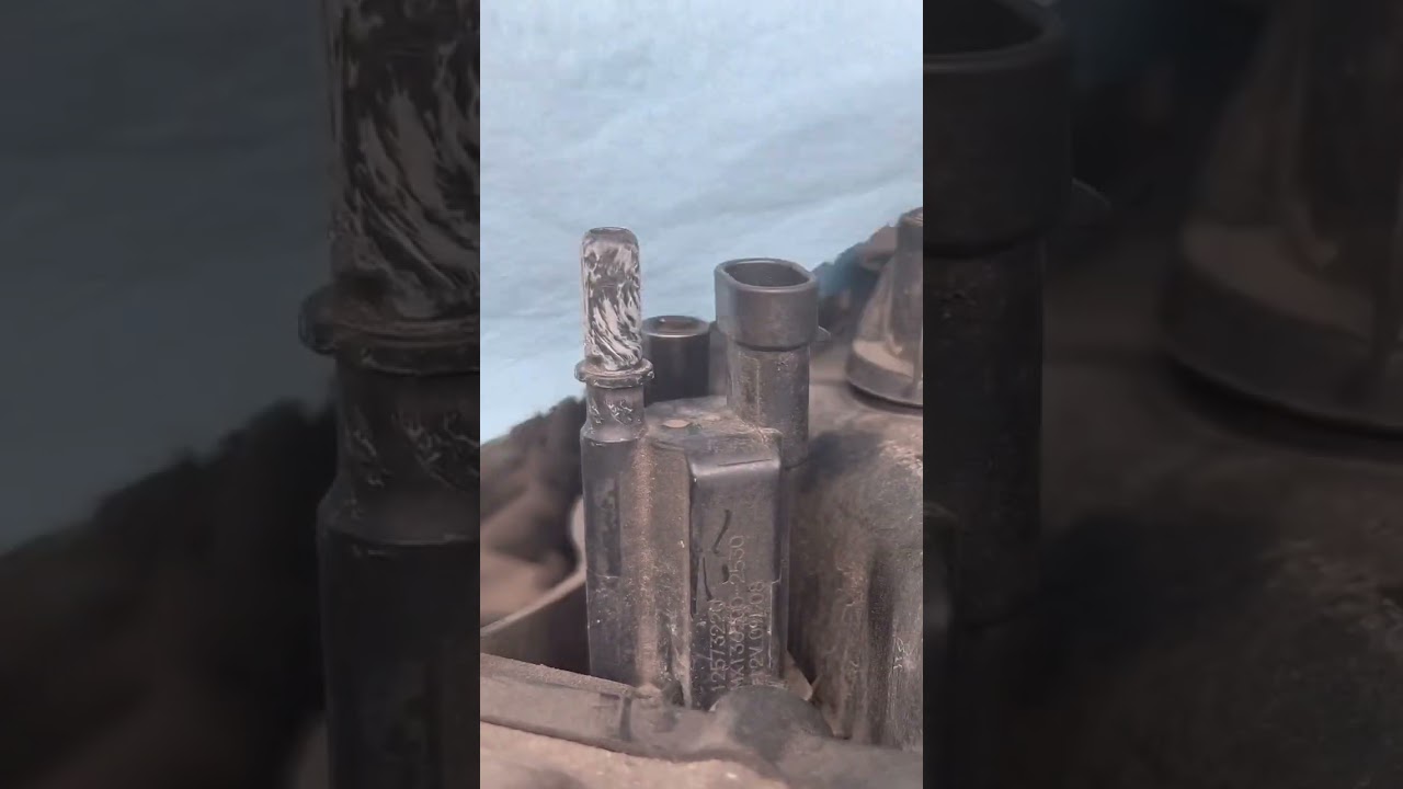 Leaking purge valve compared to new one. Chevrolet Silverado 5.3 Vortec L33