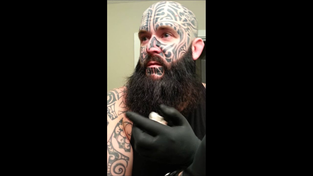 Crazy man tattooing own face!!!!