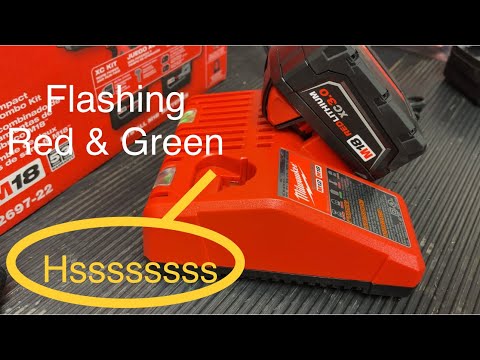 Milwaukee Battery Charger Hissing & Flashing red and green. Hissing sound normal?