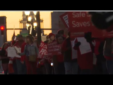U of M Health Sparrow Nurses and Healthcare Professionals picket in front of hospital, currently...