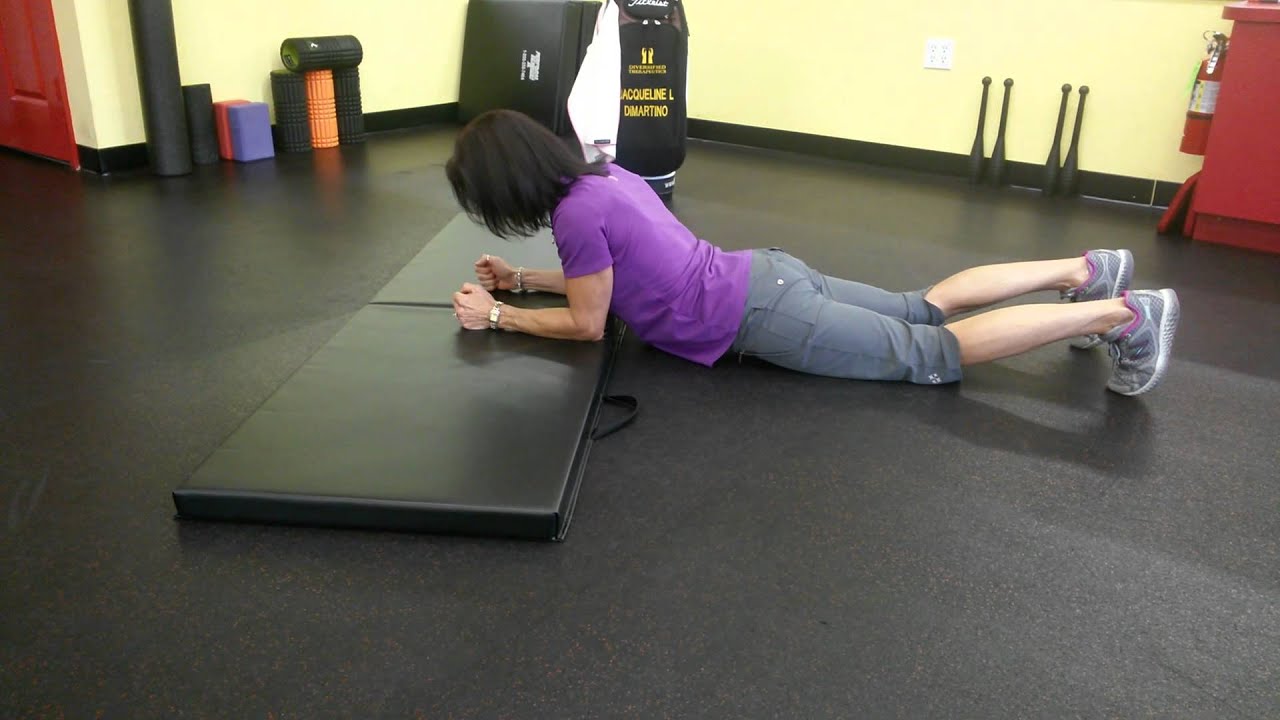 Plank progression with shoulder taps