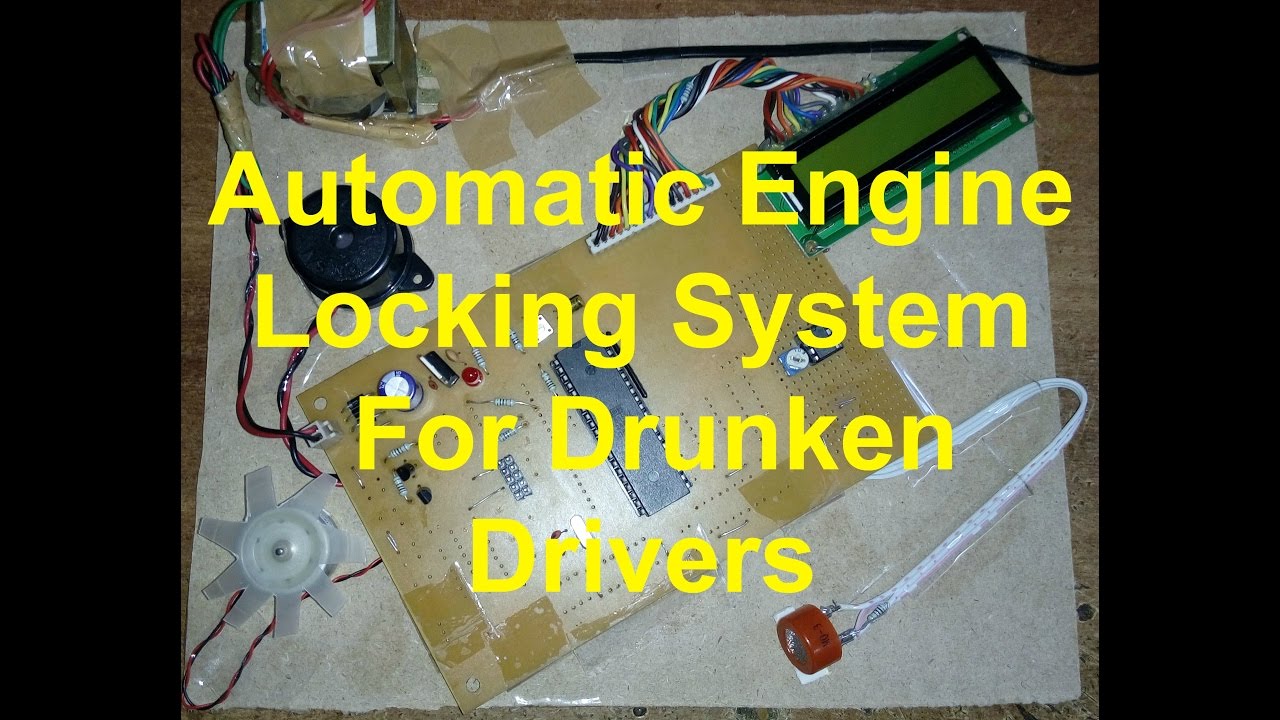 Microcontroller based automatic engine locking system for drunken drivers