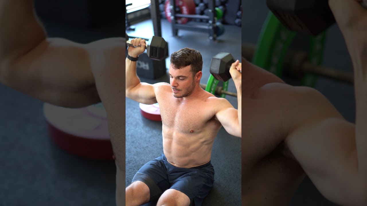 L-Sit dumbbell press