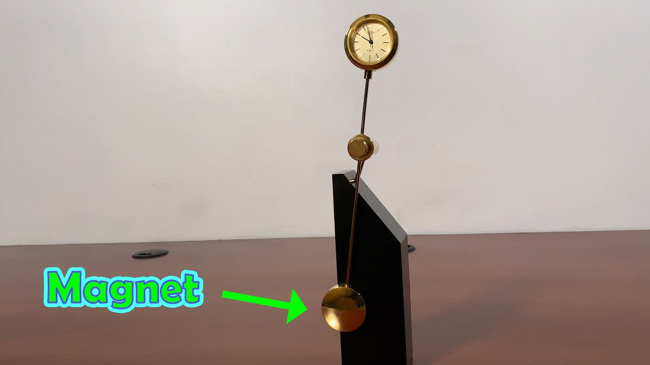 Seiko QUF101G Swinging Magnetic Pendulum Clock -- Gadgetify
