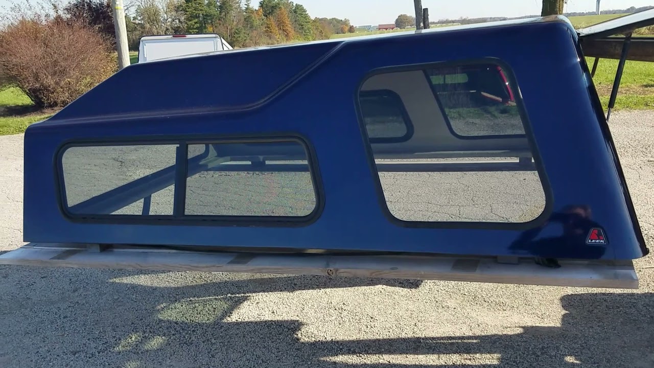 Walk around used fiberglass cap Leer 122 High Rise for sale 07-13 Chevy L/B Dark Blue good condition