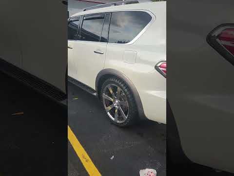 24 inch chrome asanti black label on Nissan Armada