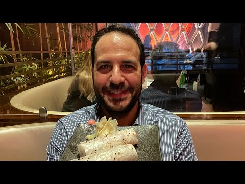 Sushi 🍣 skirt steak 🥩 crab 🦀 rolls, and a white chocolate cheesecake wall at Koi New York
