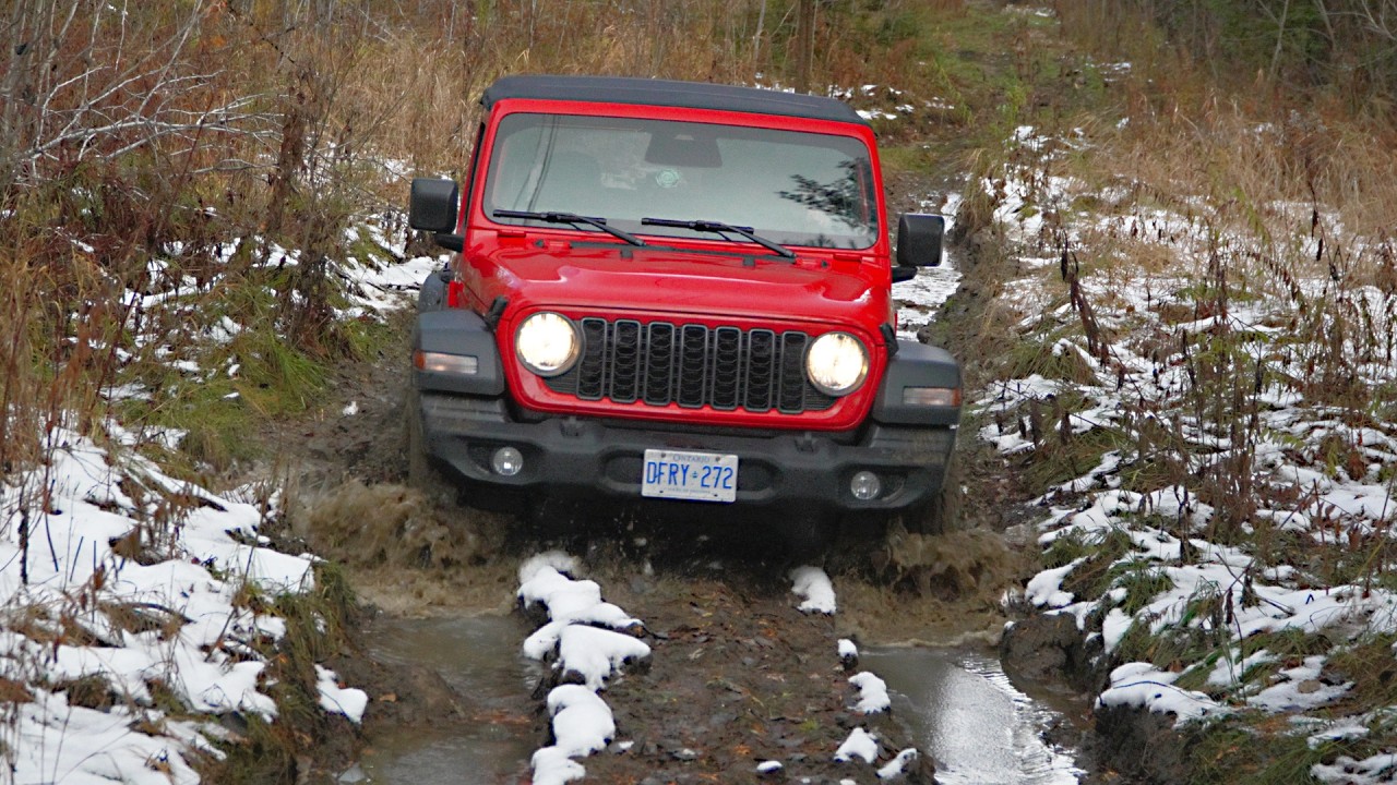 Is the Cheapest Jeep Wrangler Good Off-Road?! 2025 Jeep Wrangler Sport Manual vs Mud, Rocks & Water